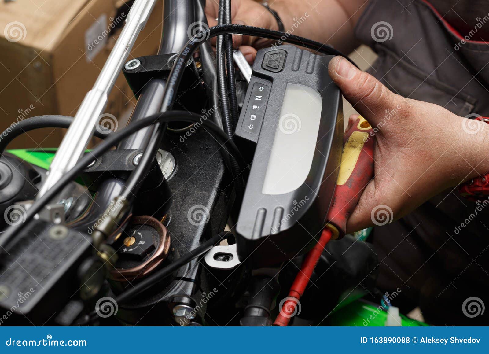 Installation of the Instrument Panel on the New Motorcycle in the ...