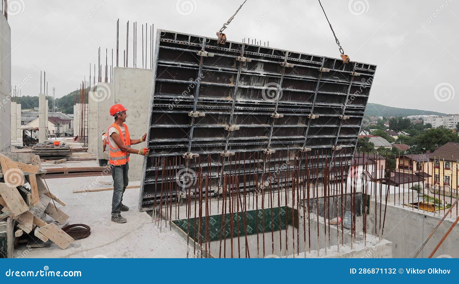Installation of a Large Metal Structure on the Roof of the Building ...