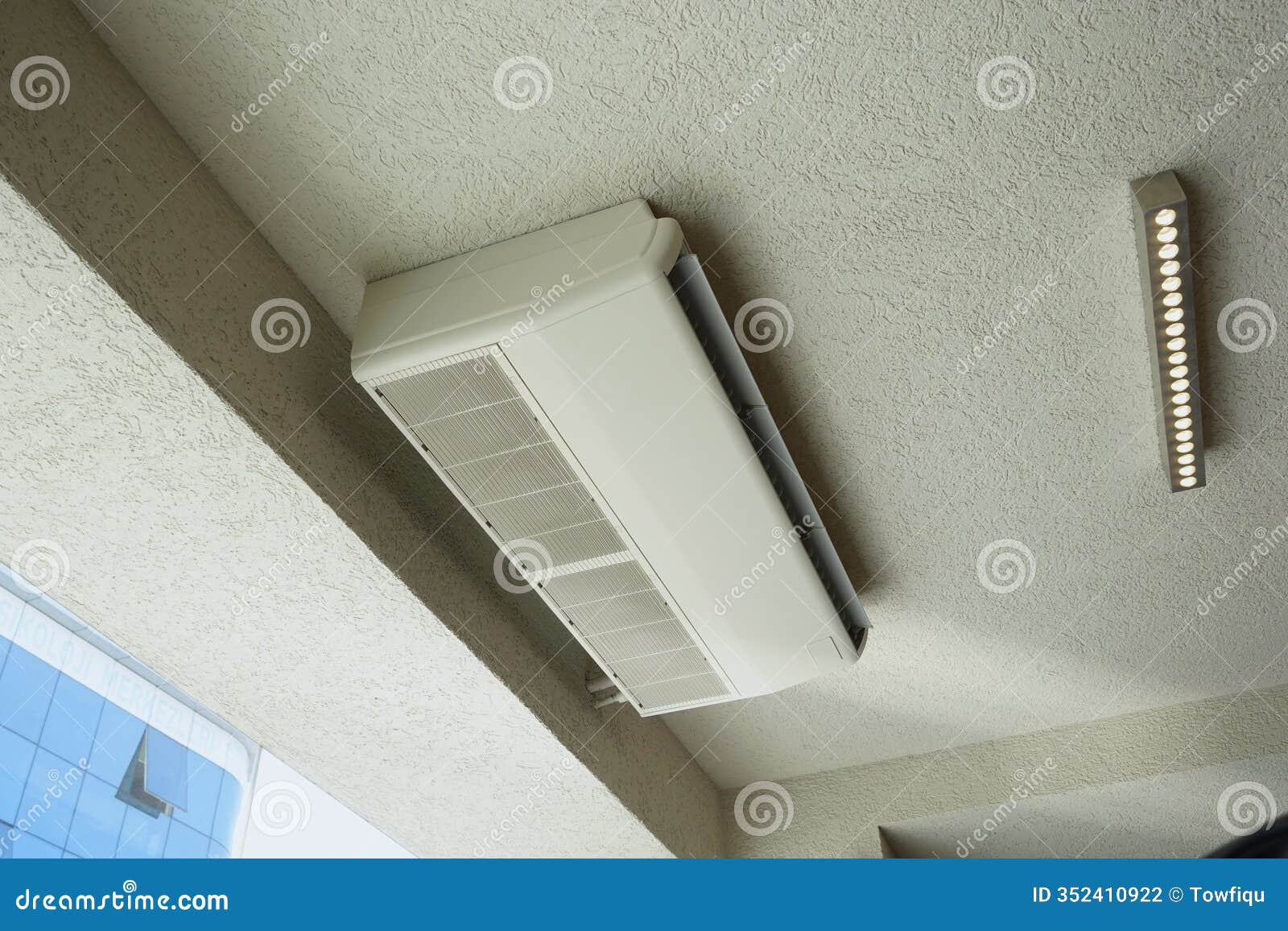 Installation of a Modern Ceiling Air Conditioner within the Office ...