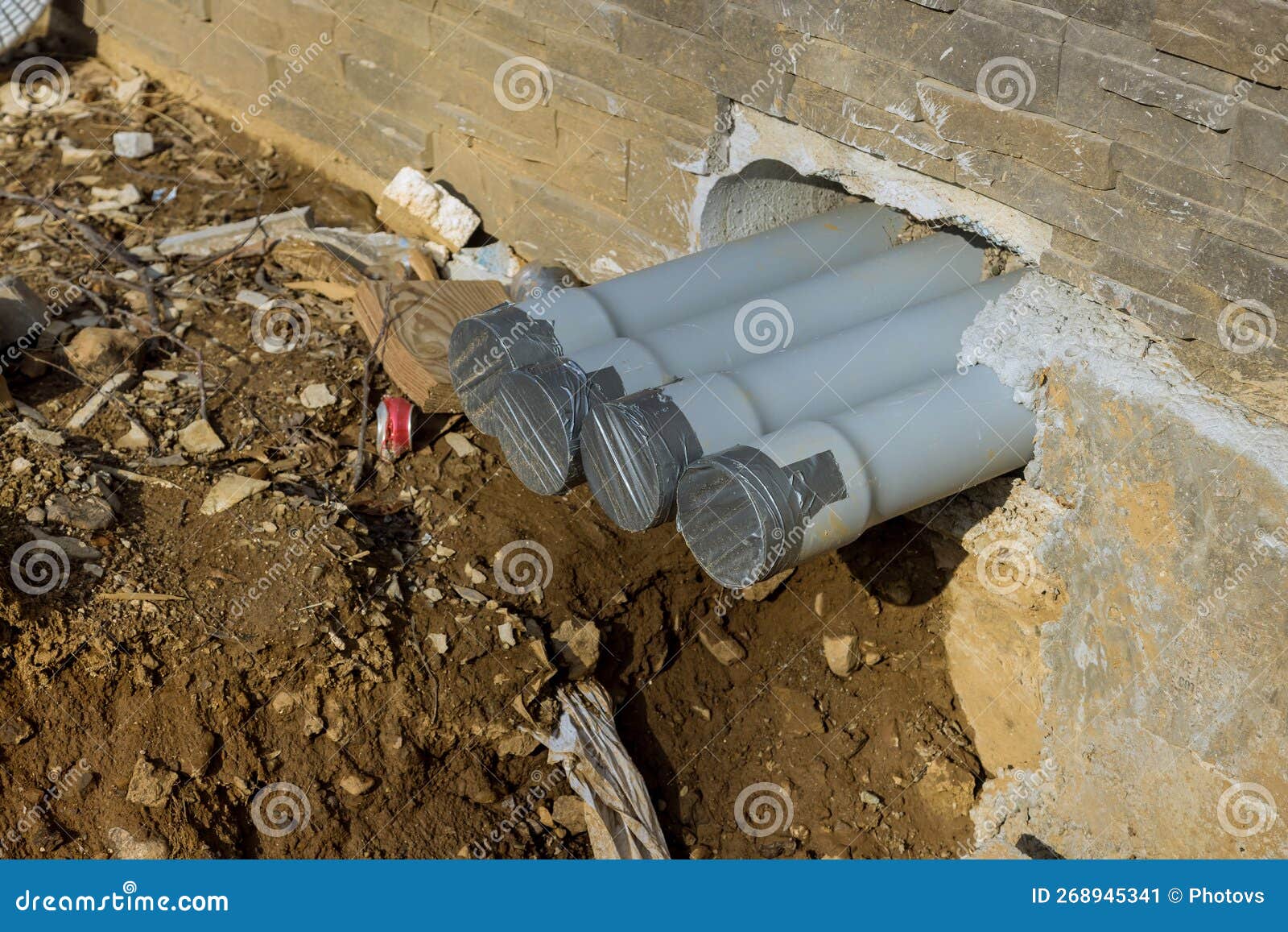 Installation of New Plastic Sewer Pipes on Ground at Trench during ...
