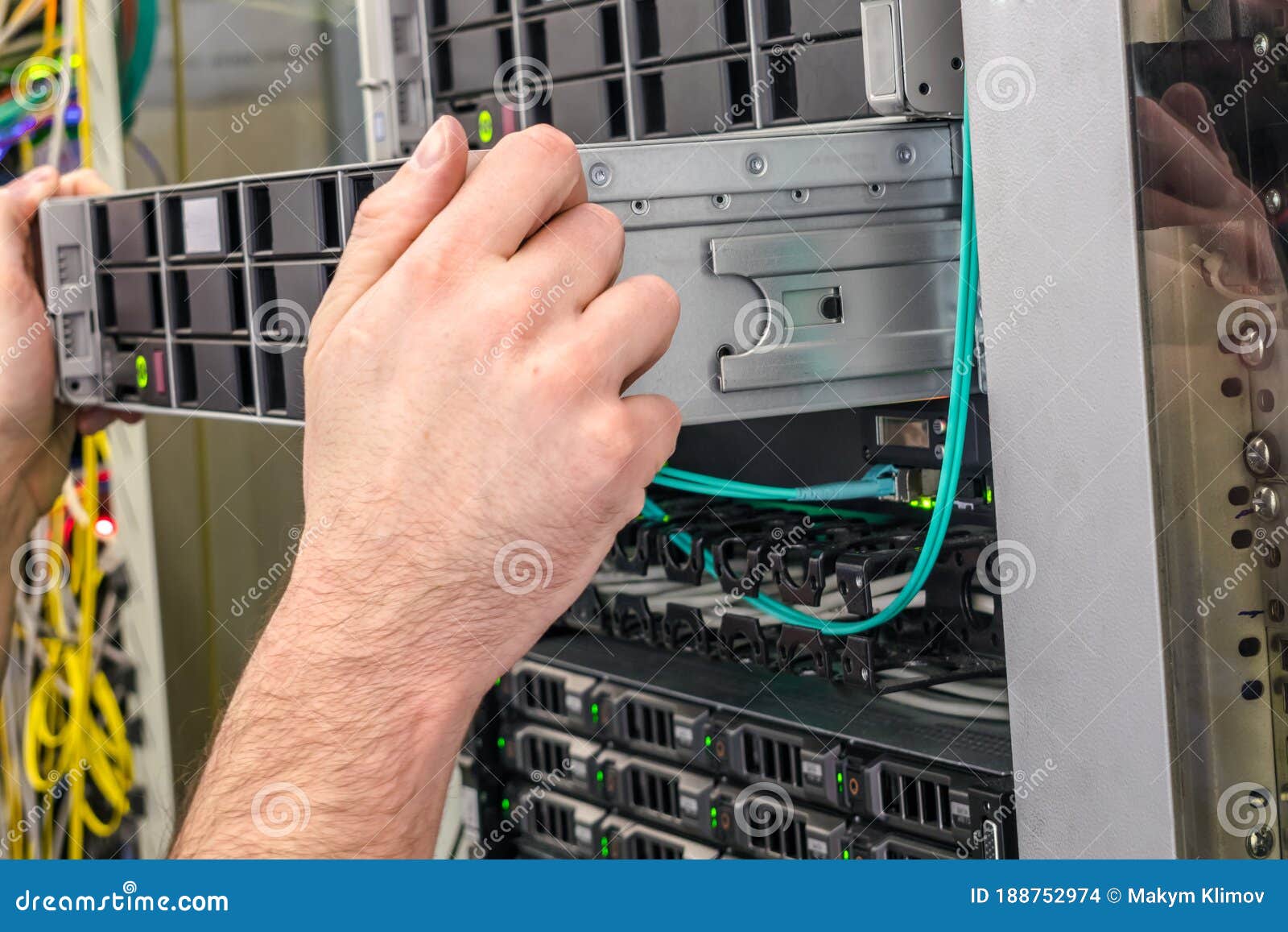 Installation of a New Server in a Rack with Computer Equipment is Close ...
