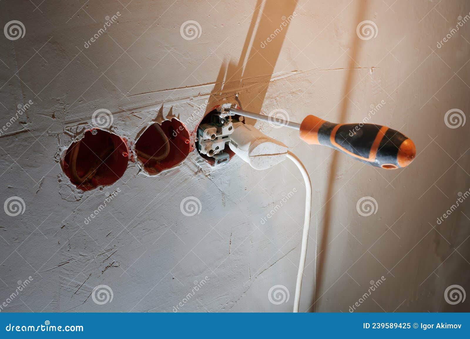 Installation of a New Socket in a Freshly Plastered Wall with Plug ...