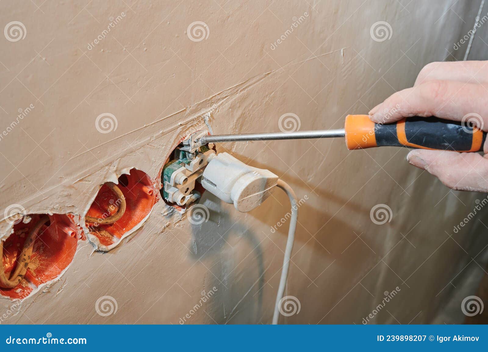Installation of a New Socket in a Freshly Plastered Wall with Plug ...