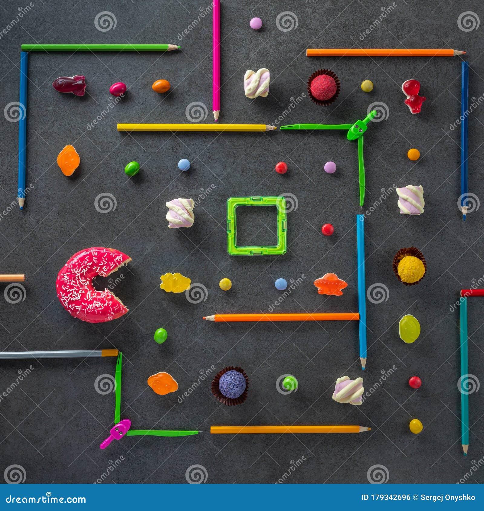 Installation of Pac Man Computer Game with Red Donut and Jelly Sweets ...