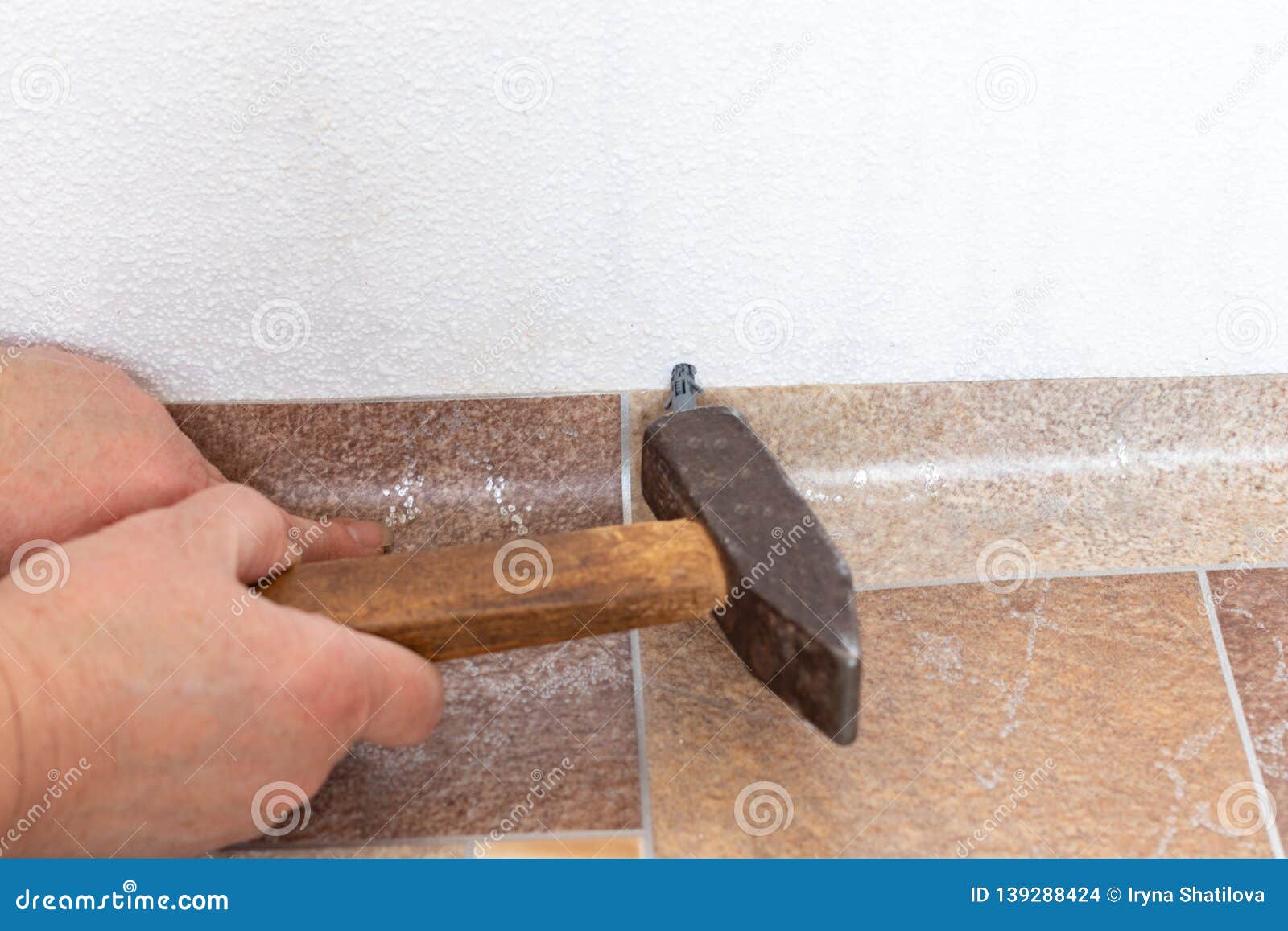 Installation of Plastic Floor Plinth. Interior Details Stock Photo ...