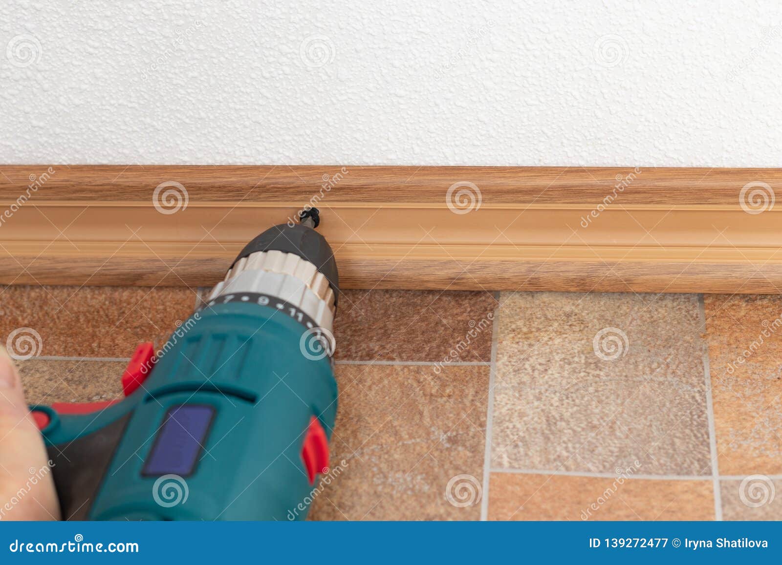 Installation of Plastic Floor Plinth. Interior Details. Stock Image ...
