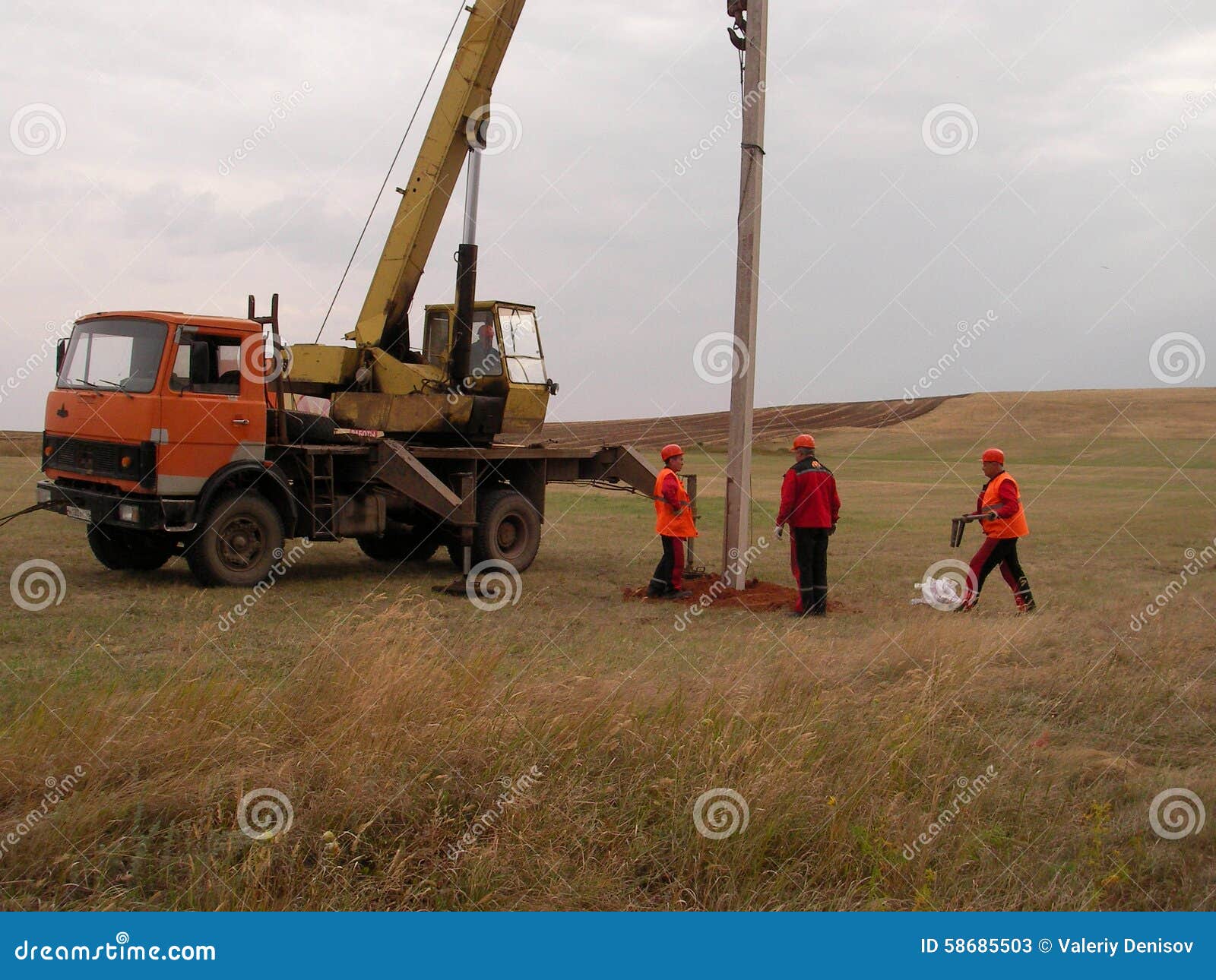 Installation of a Power Line Editorial Stock Photo - Image of crane ...