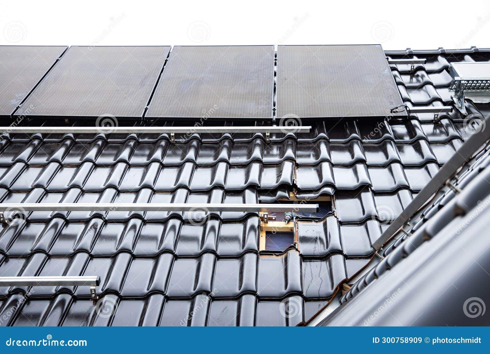 Installation in Progress of Solar Panels on a Residential Rooftop Stock ...