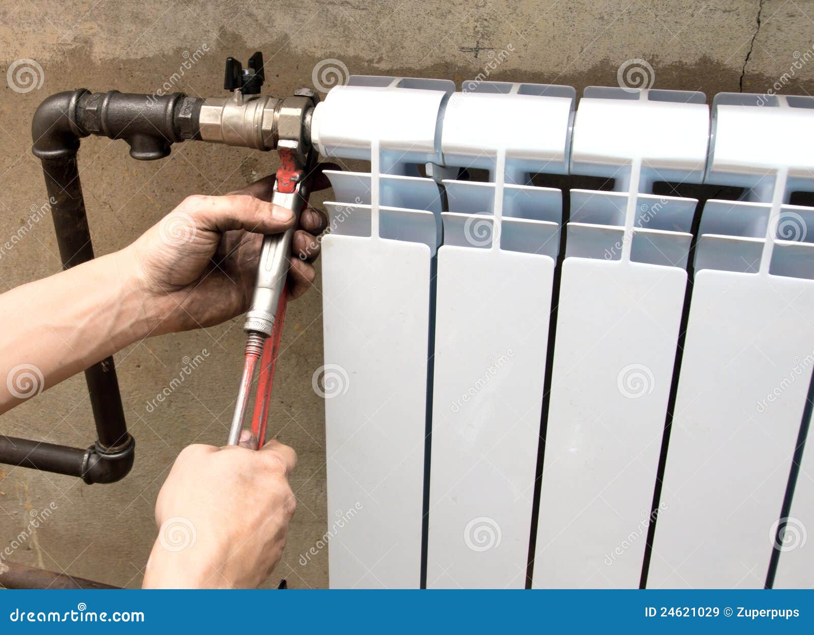 Installation of a radiator stock image. Image of natural - 24621029