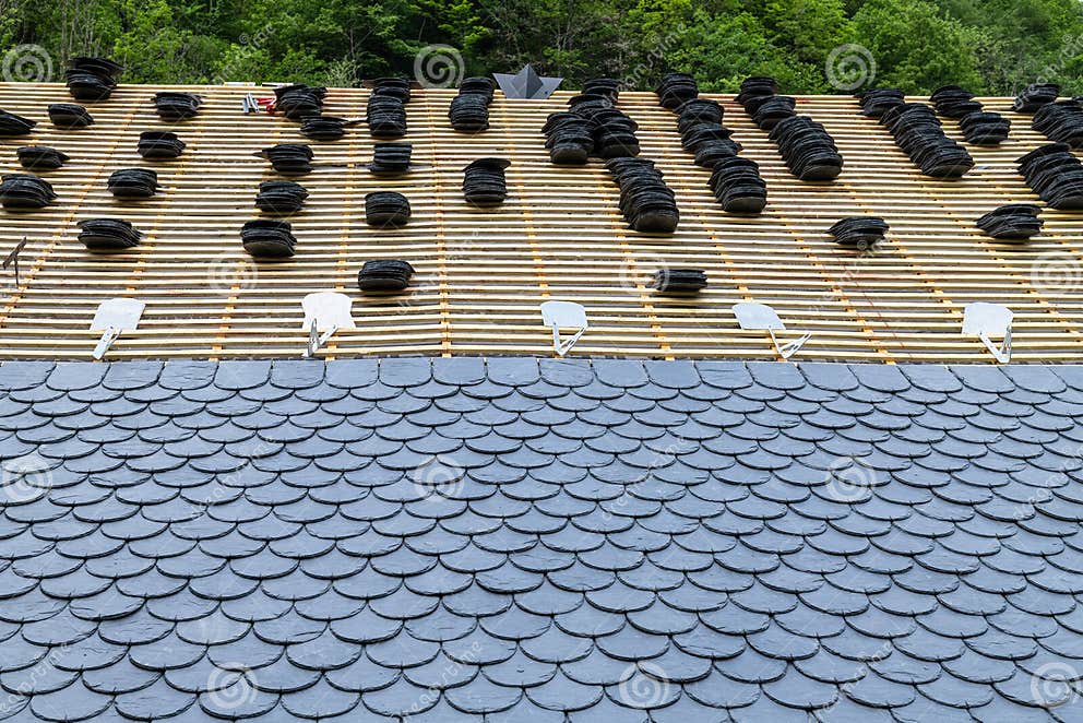 Installation of Slate Roofing Tiles on a Roof Stock Photo - Image of ...