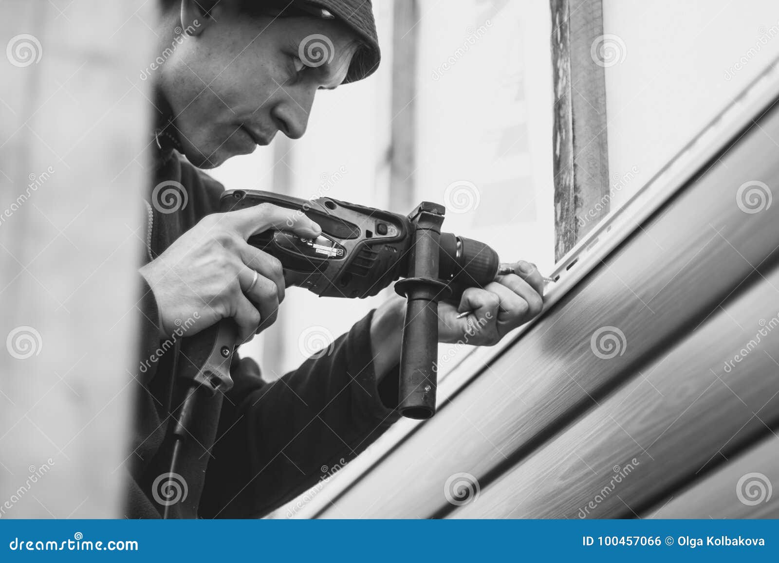 Installation of siding stock photo. Image of construction - 100457066
