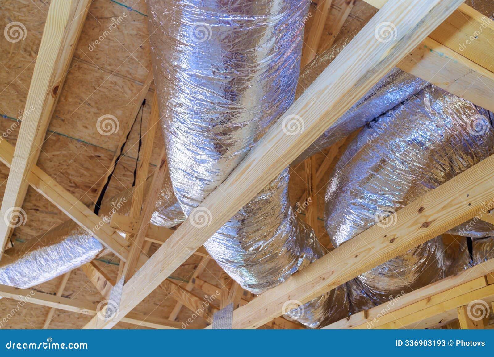 Installation of Silver Insulation Ventilation HVAC Pipes from Ceiling ...