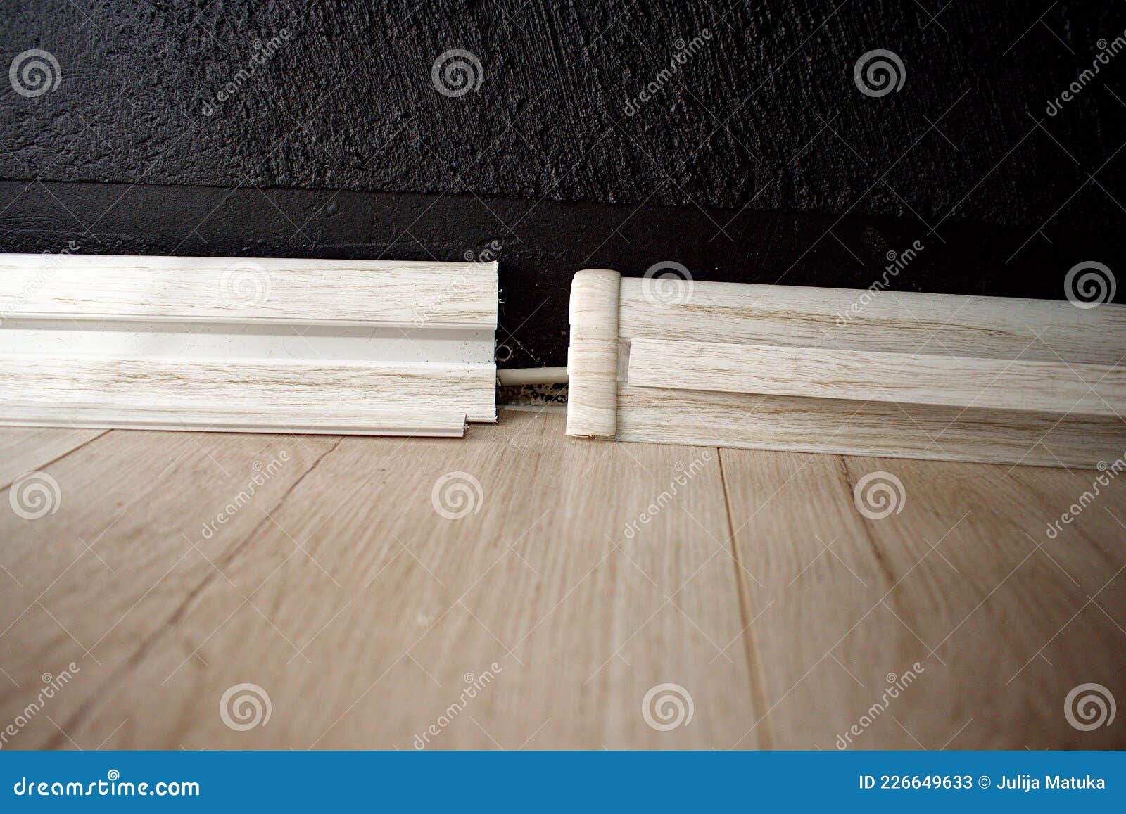 Installation of Skirting Boards and Electrical Wiring in Them ...