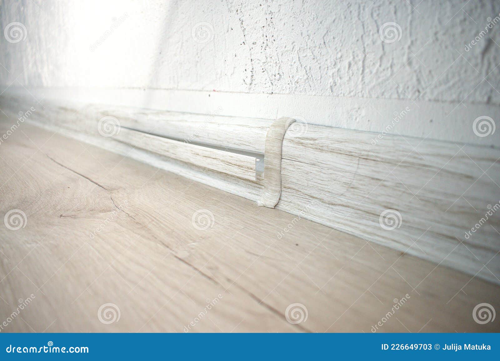 Installation of Skirting Boards and Electrical Wiring in Them ...