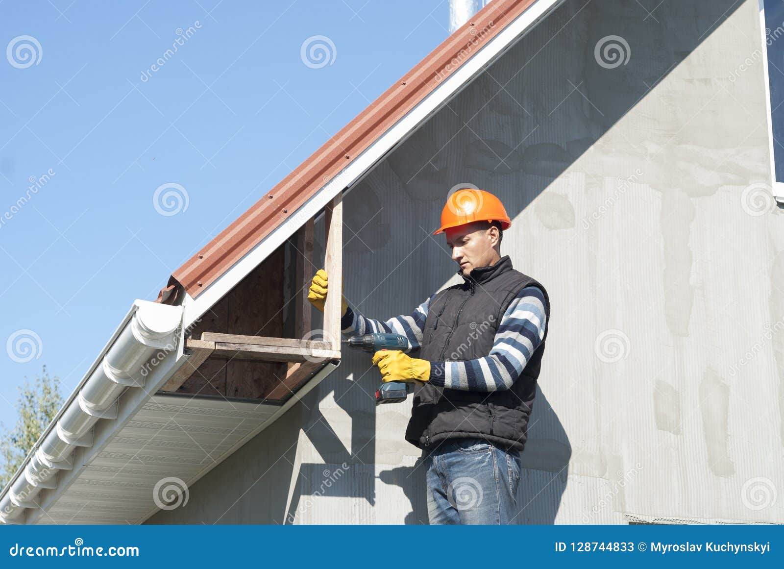 Installation of soffits stock image. Image of corner - 128744833
