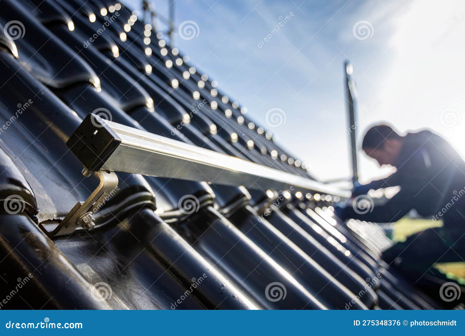 Installation of Solar Panel Support Structures on a Tiled Roof Stock ...