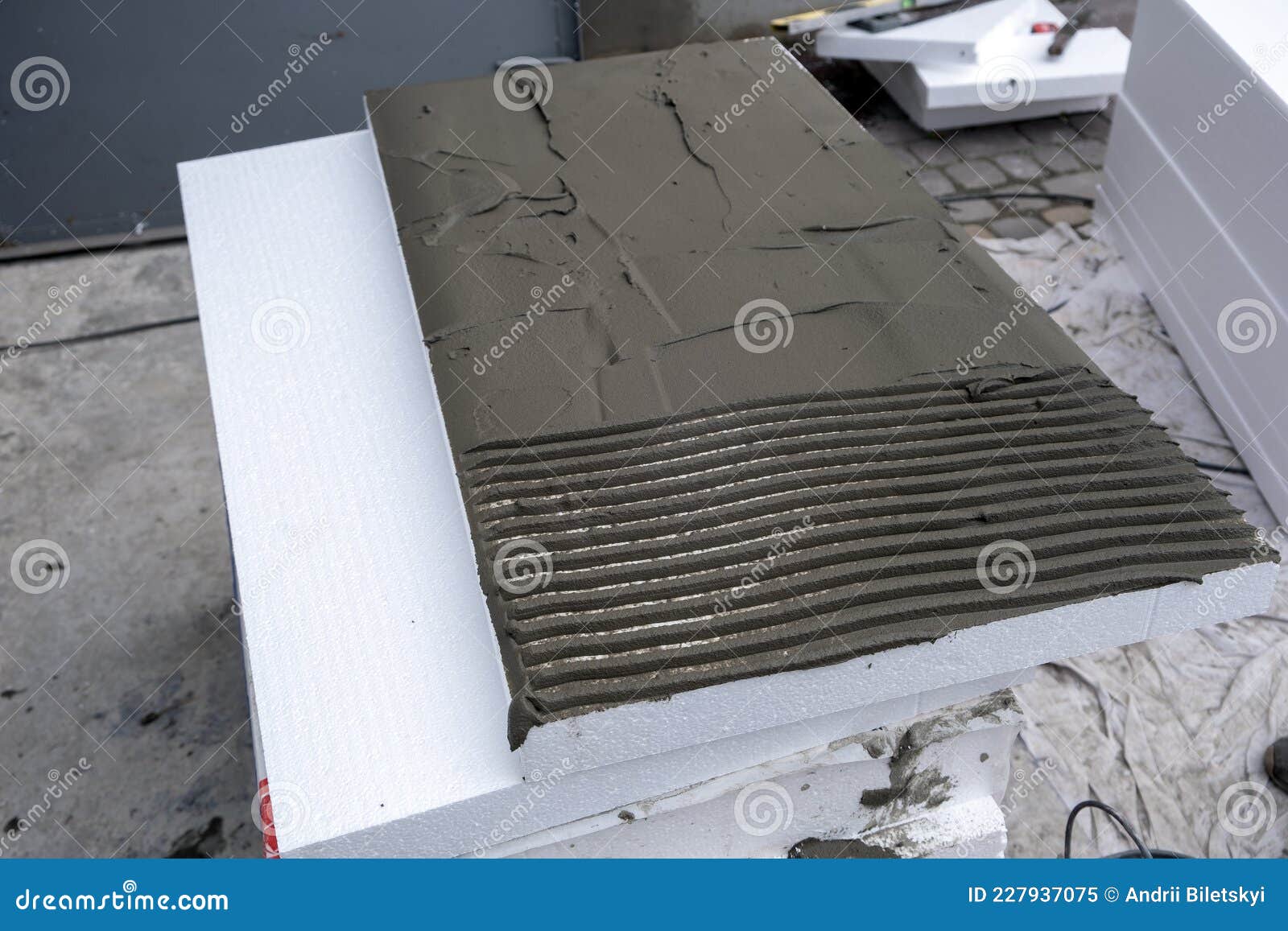 Installation of Styrofoam Insulation Sheets on House Facade Wall for ...