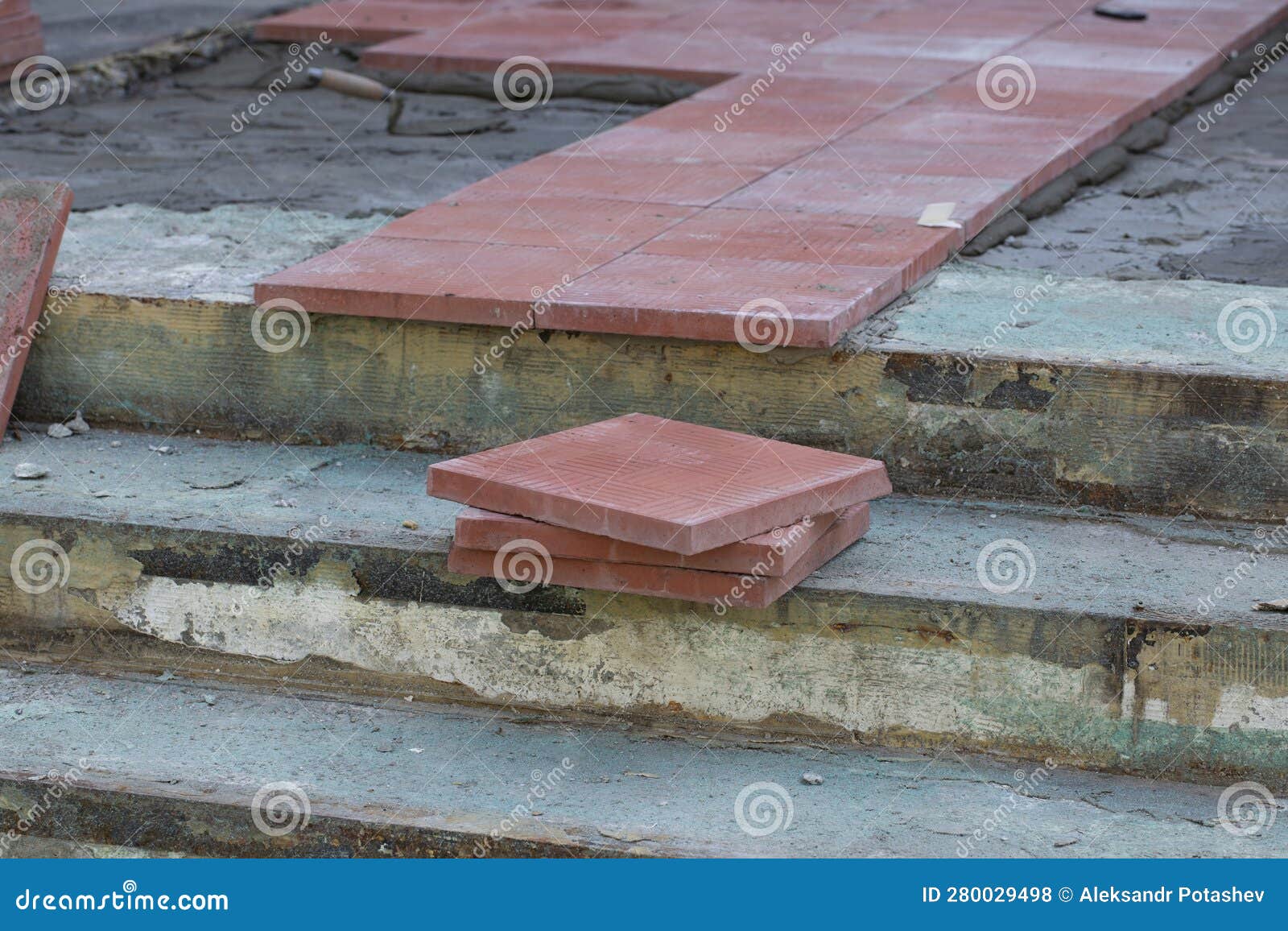 Installation of Tiles for Pedestrian Paths. Improvement of the City ...
