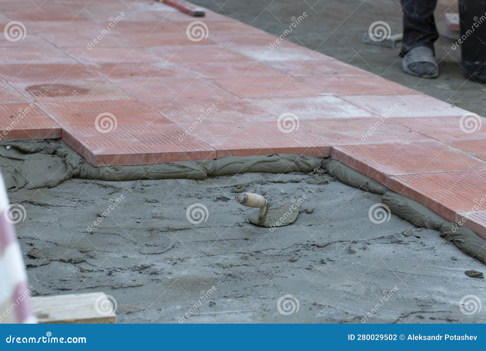 Installation of Tiles for Pedestrian Paths. Improvement of the City ...