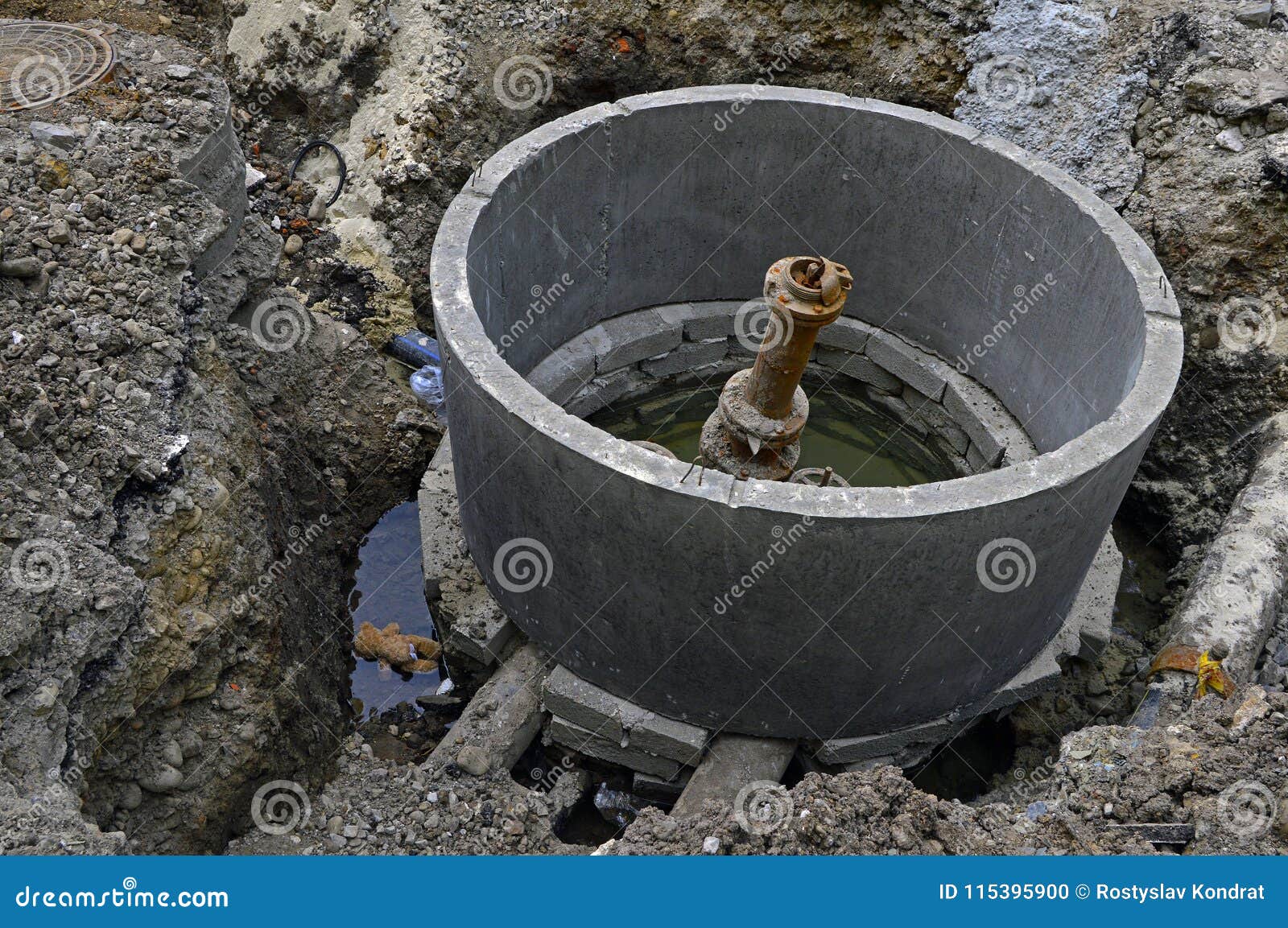 Installation of a well stock photo. Image of replacement - 115395900