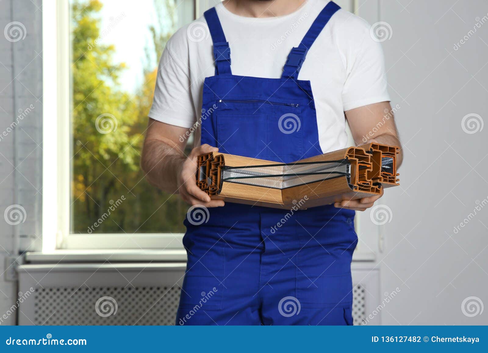 Installation Worker with Sample of Modern Window Profile Indoors Stock ...
