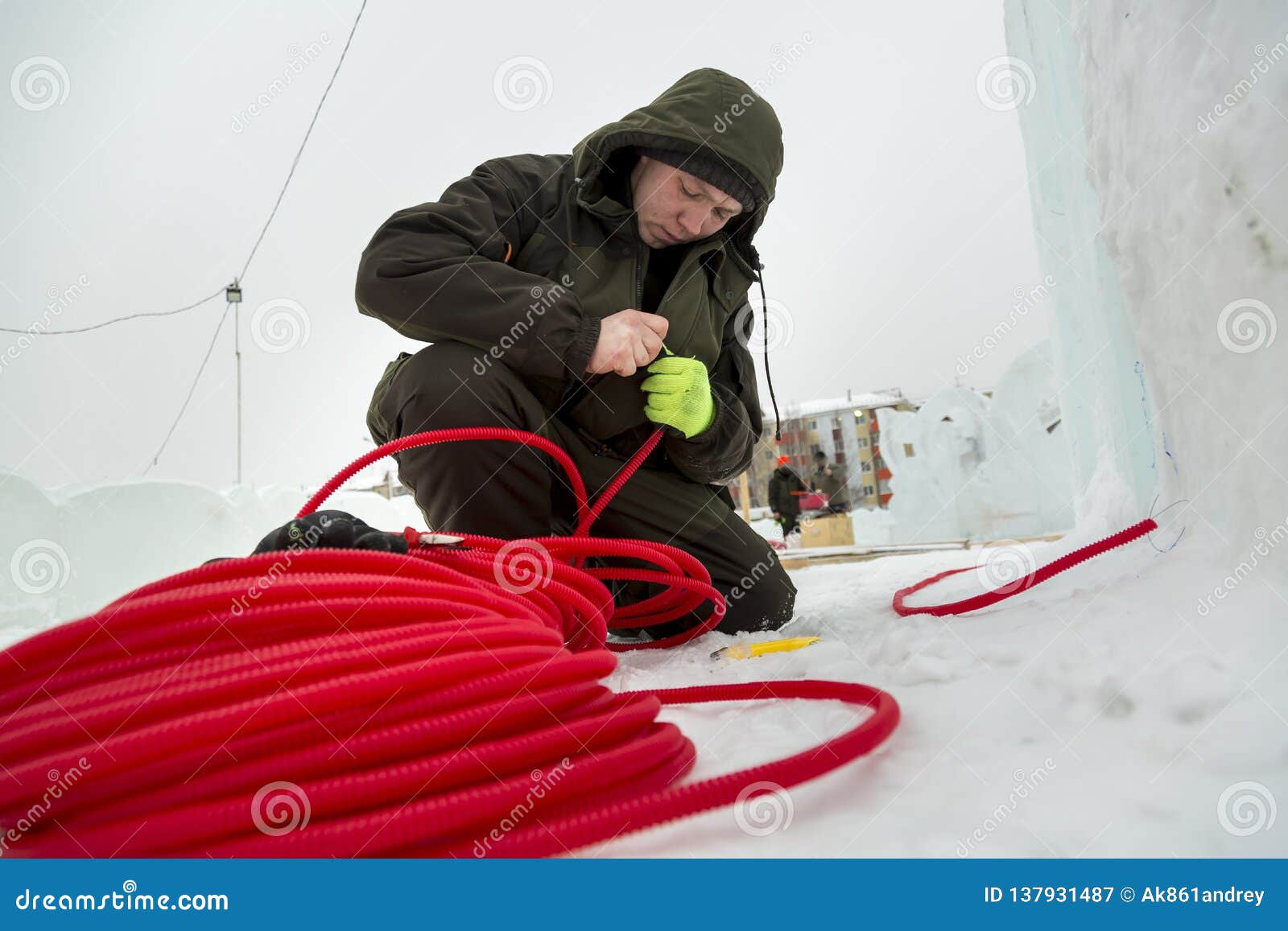 The Installer is Installing the Power Cable for Lighting Stock Image ...