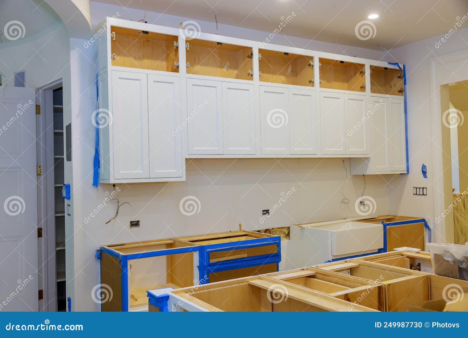 Installing and Assembling Modern Kitchen Cabinets Stock Photo - Image ...
