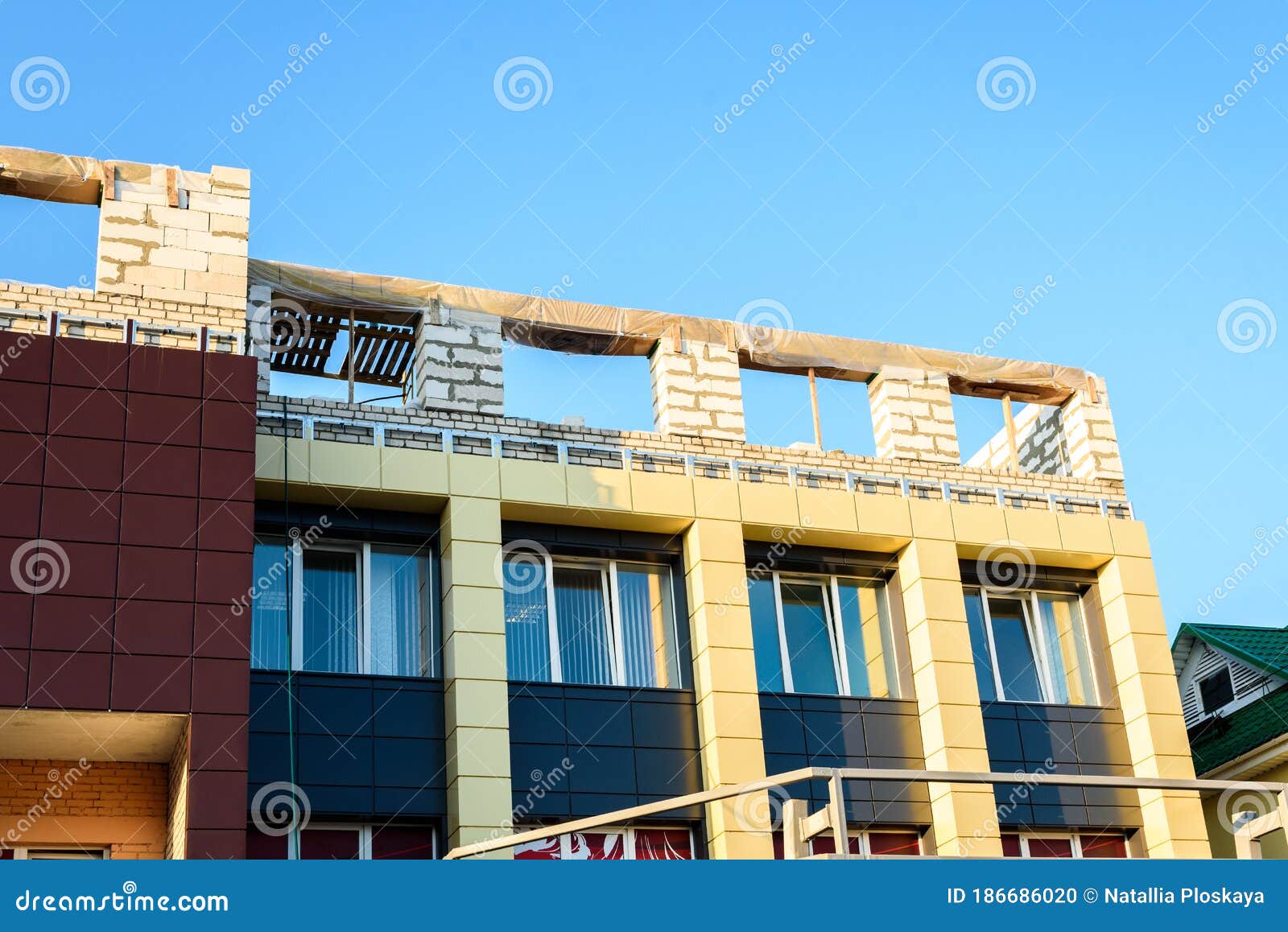 Installing Big Tile on a Building Facade Stock Photo - Image of ...