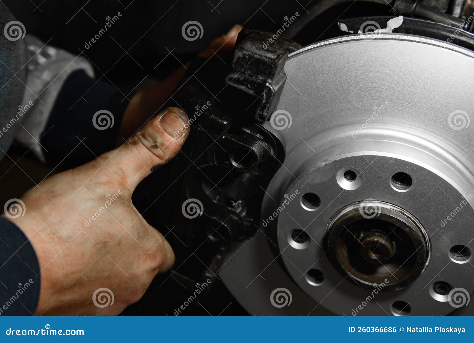 Installing Brake Pads on Modern Car. Stock Photo - Image of garage ...