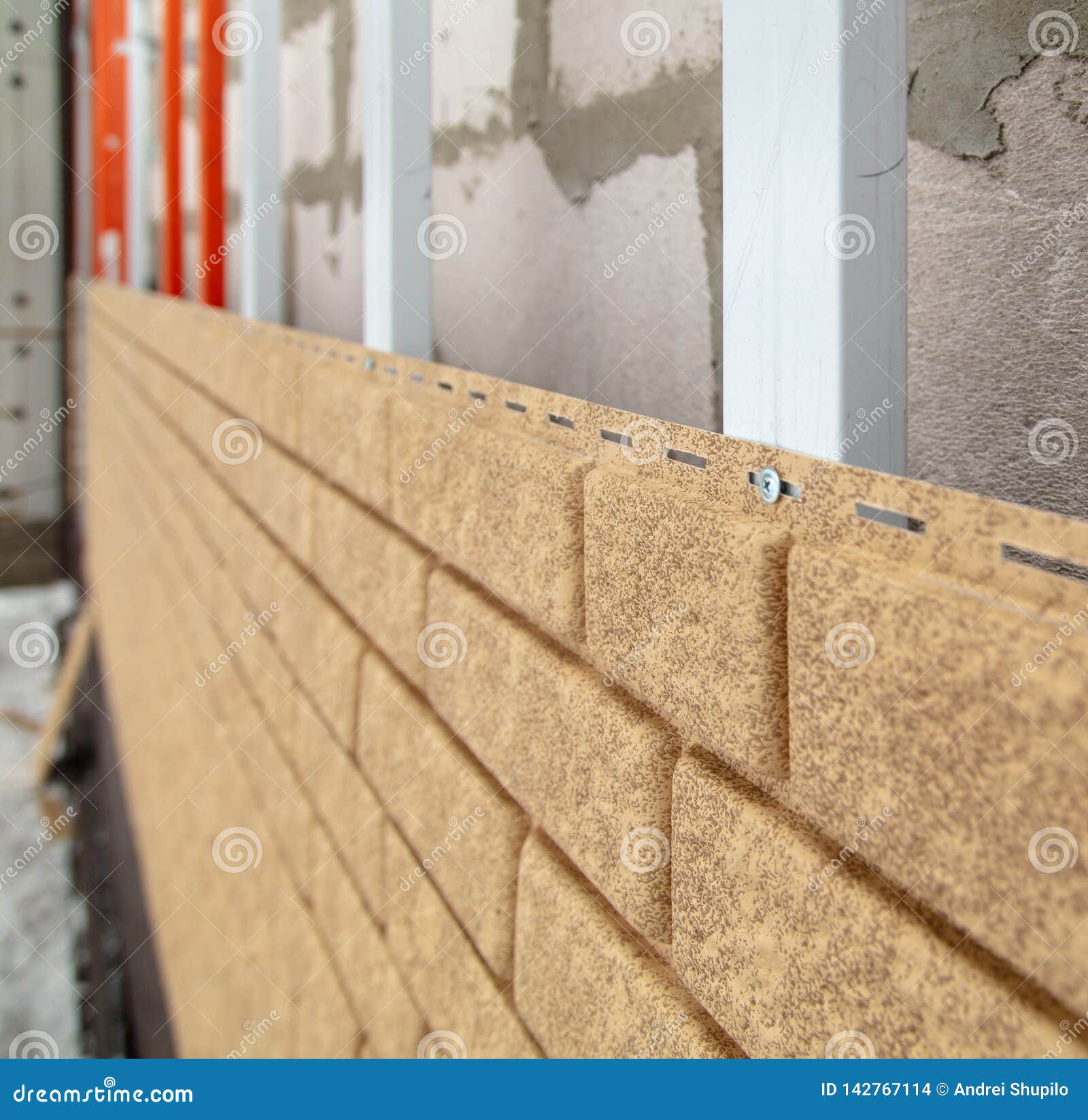 Installing Brick Siding on the Wall of the House Stock Photo - Image of ...