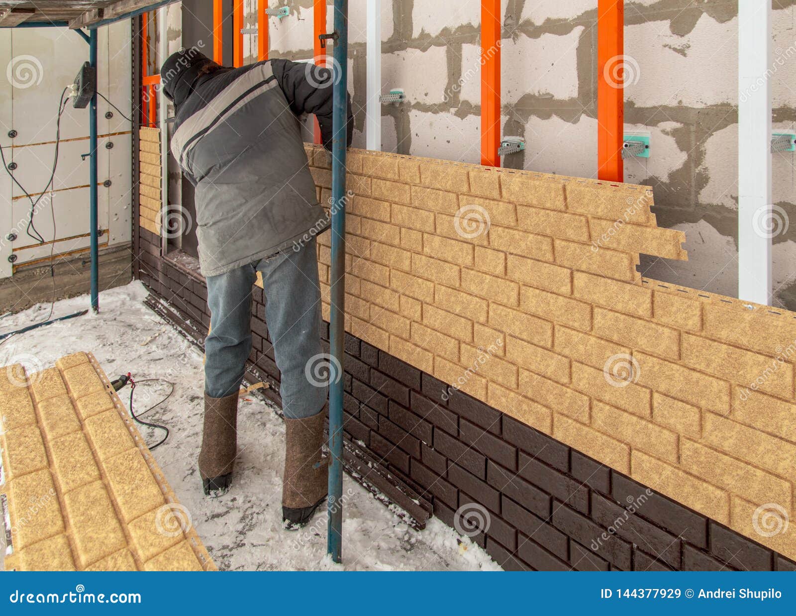 Installing Brick Siding on the Wall of the House Editorial Stock Image ...