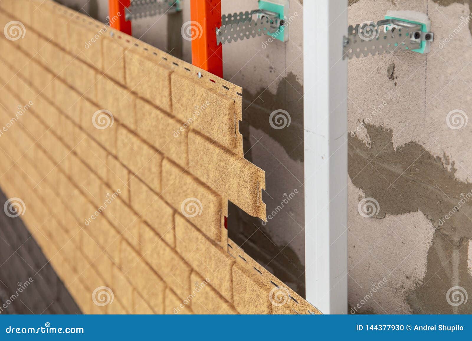 Installing Brick Siding on the Wall of the House Stock Photo - Image of ...