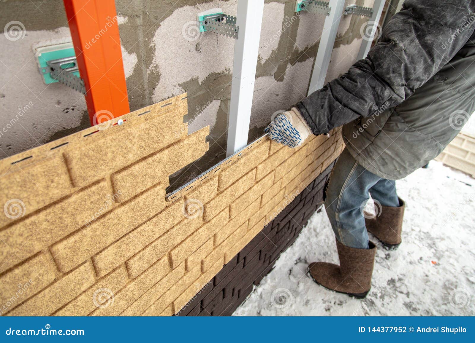 Installing Brick Siding on the Wall of the House Stock Photo - Image of ...