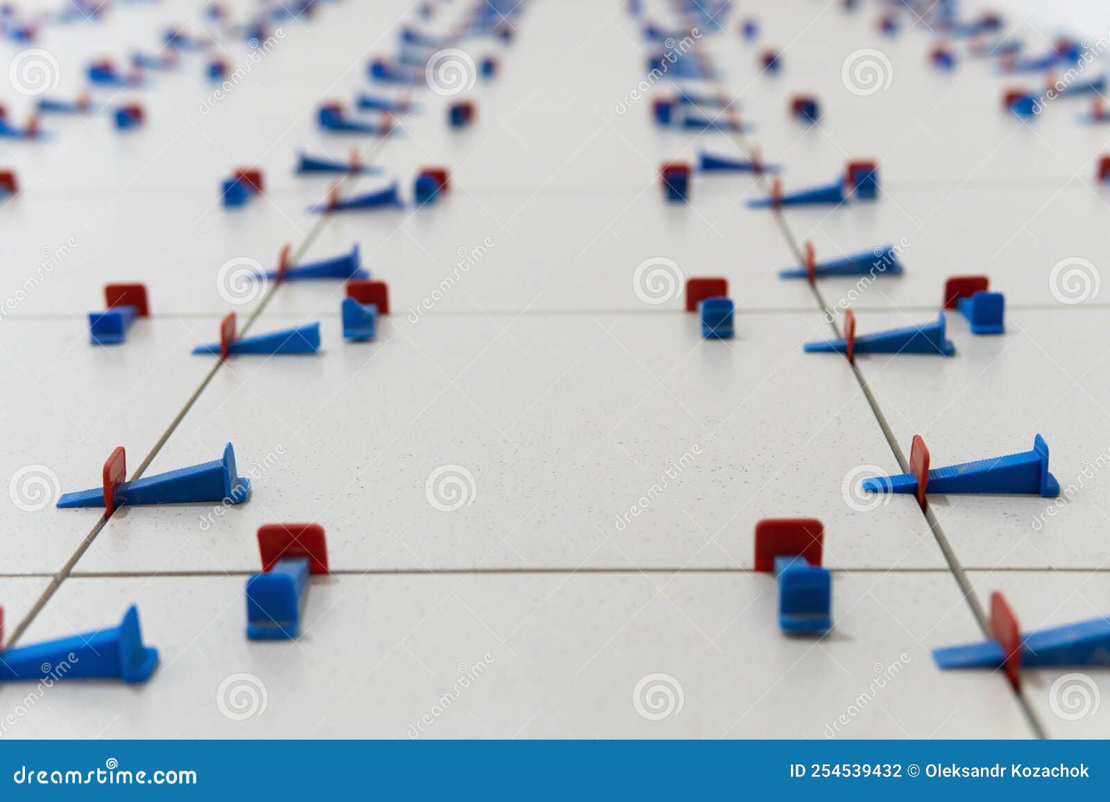 Installing Ceramic Floor Tile in New Construction Work by Tile Glue for ...