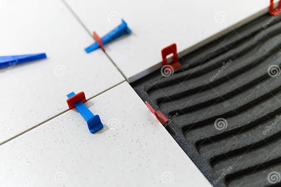 Installing Ceramic Floor Tile in New Construction Work by Tile Glue for ...