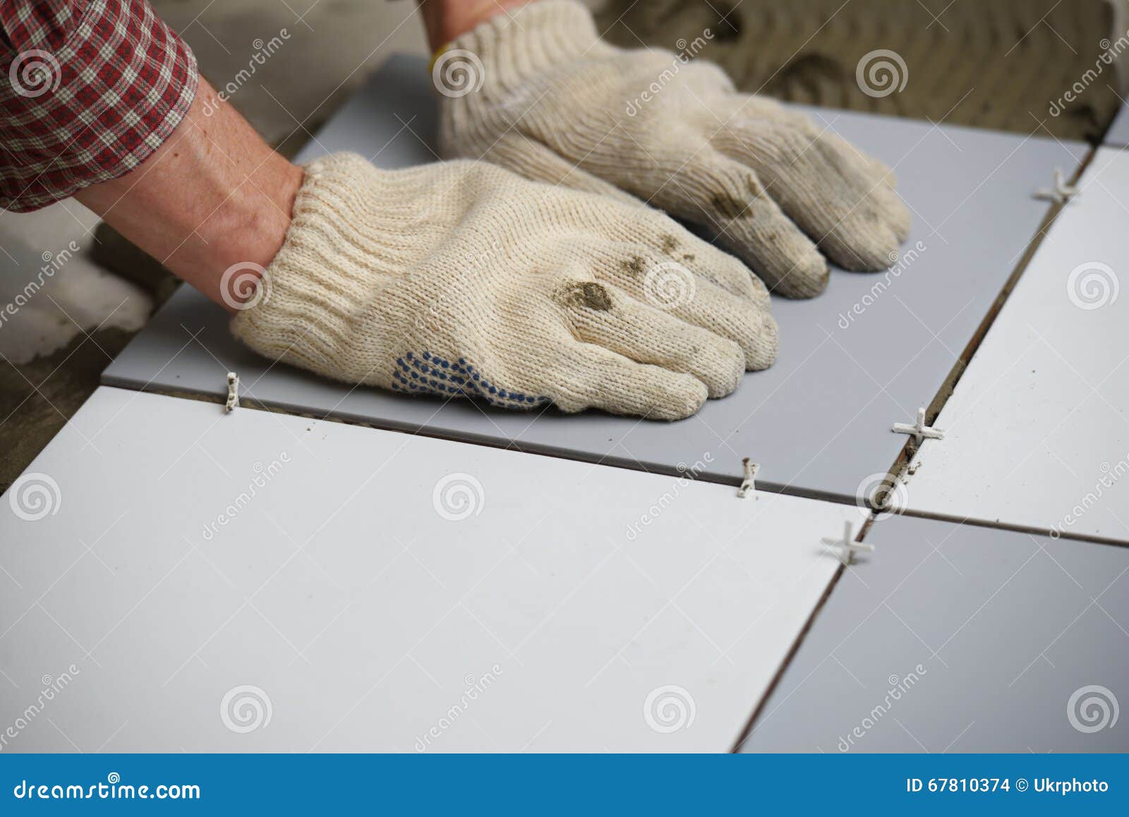 Installing Ceramic Tiles on a Floor Stock Photo - Image of flooring ...