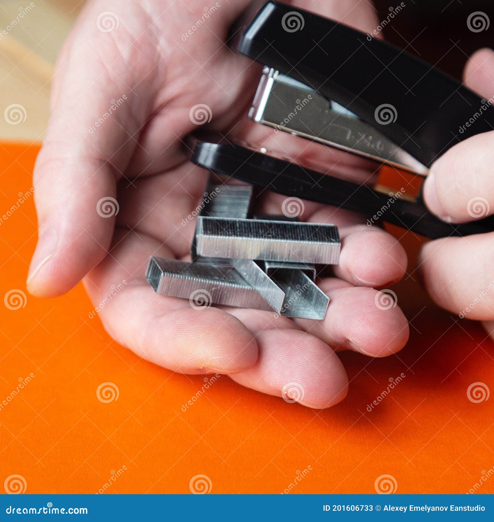 Installing Clamp Staples in a Stationery Stapler Stock Image - Image of ...