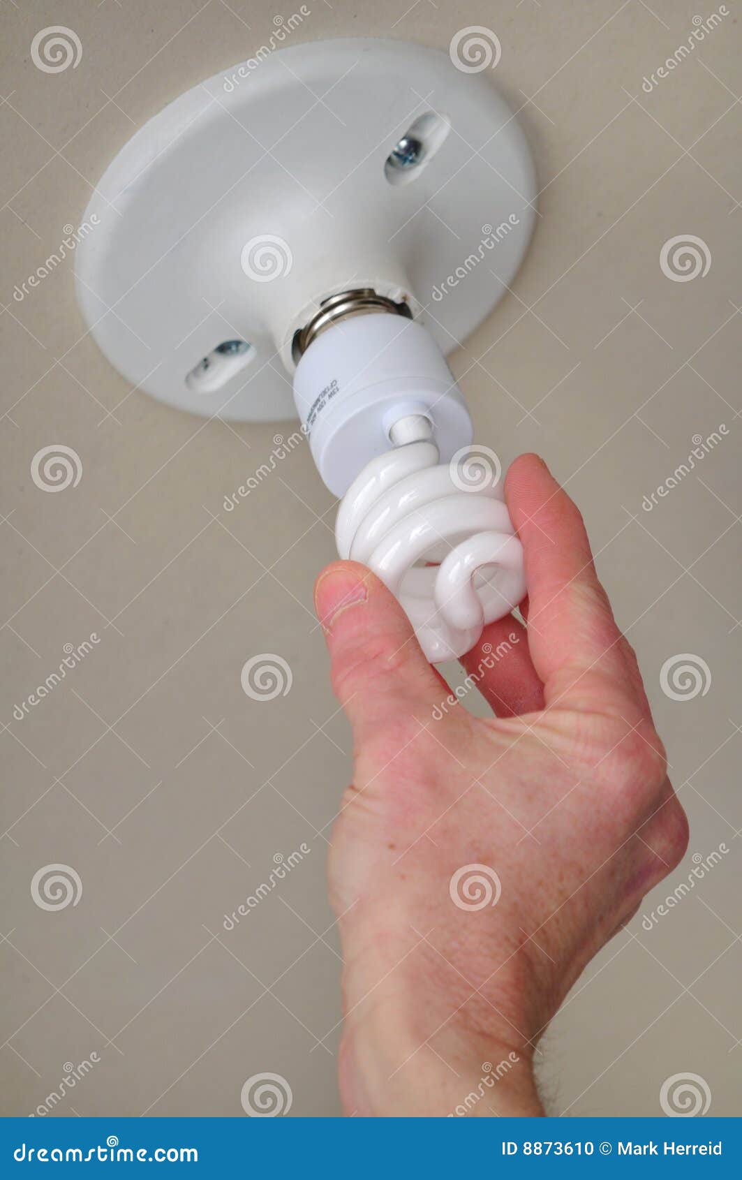 Installing Compact Fluorescent Light (CFL) Stock Photo - Image of bulb ...
