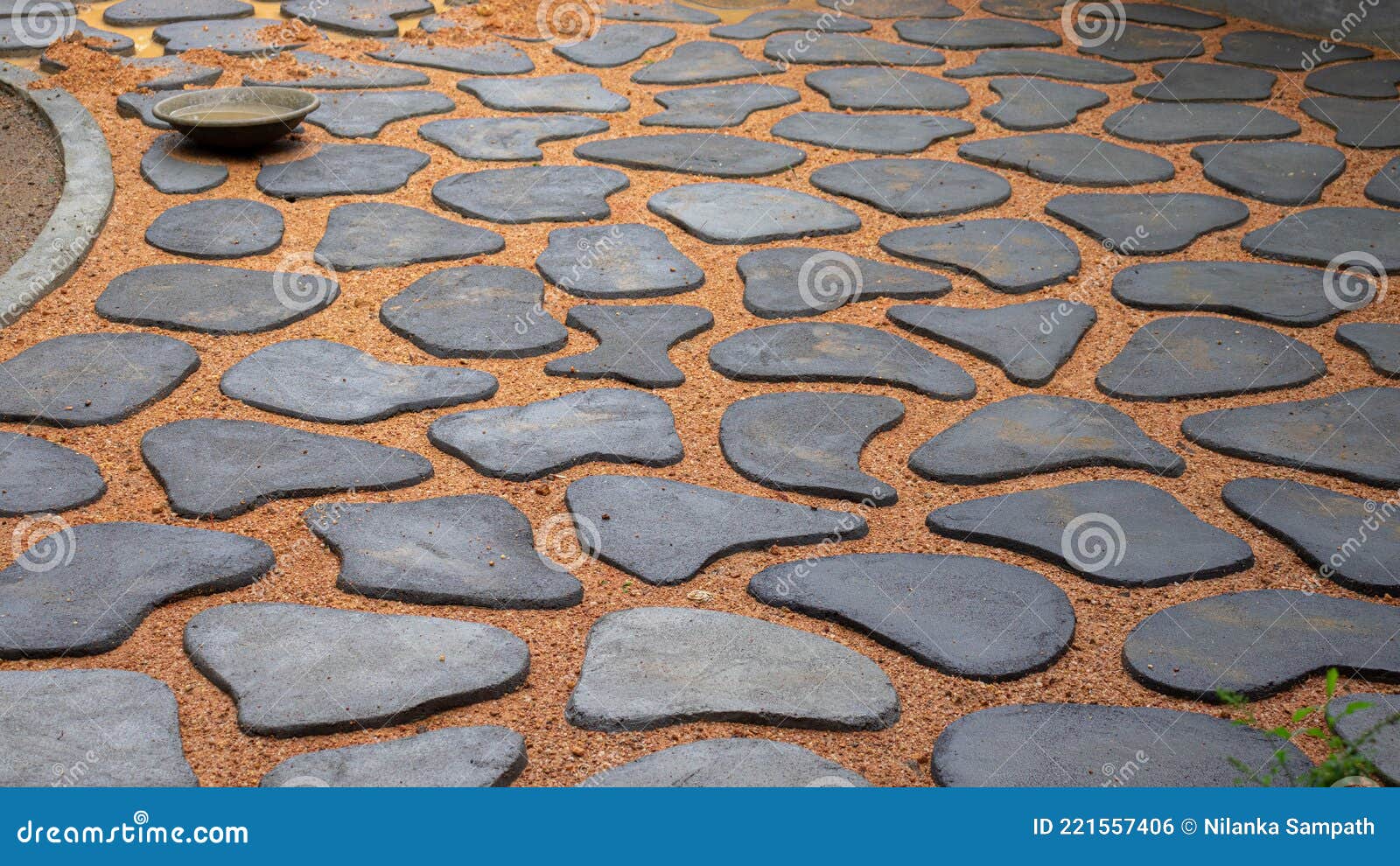Installing Concrete Pavement Blocks in the Garden Pathway Stock Photo ...
