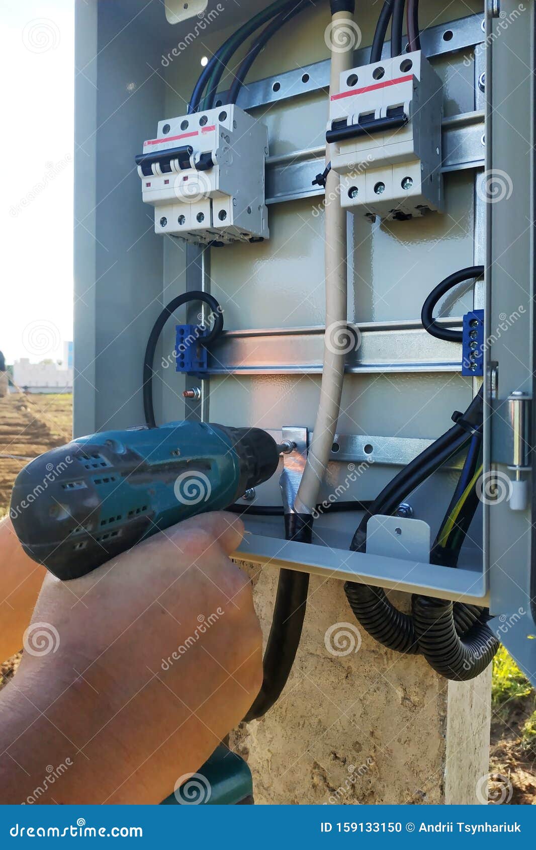 Installing and Connecting an Electrical Panel on the Street Stock Photo ...