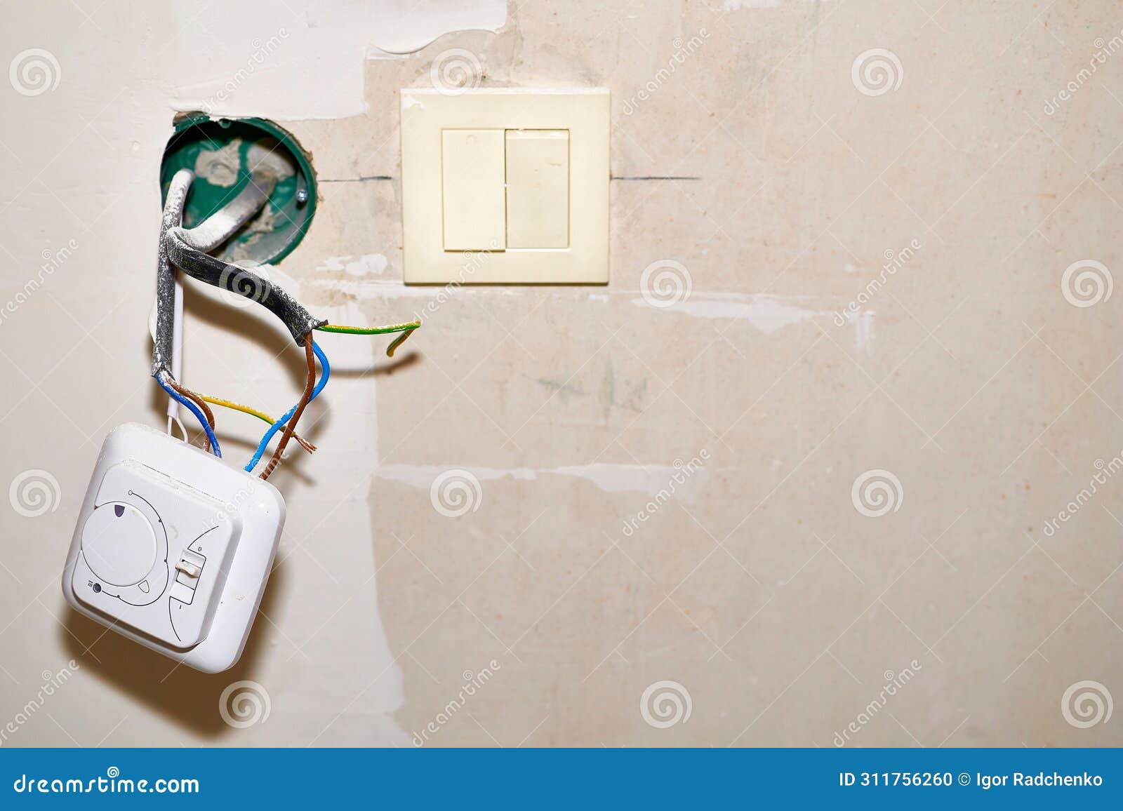 Installing and Connecting a Light Switch into the Wall Stock Photo ...