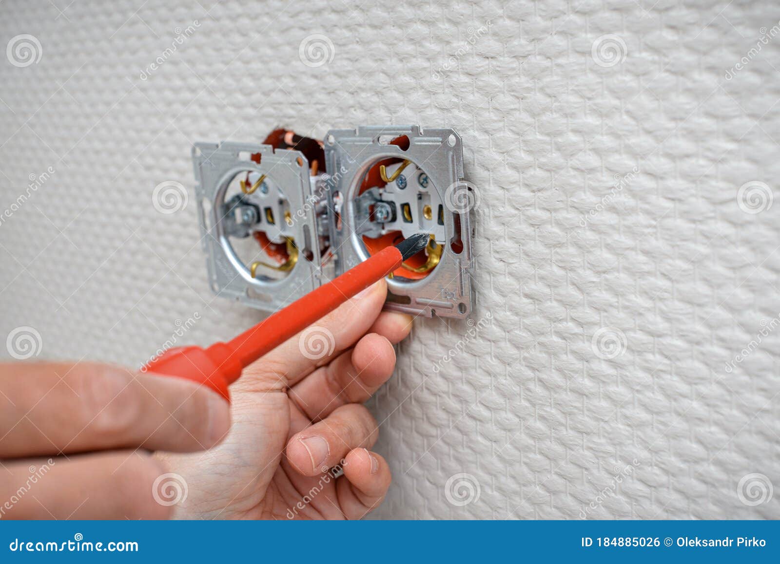 Installing an Electrical Outlet in the Socket Box Stock Photo - Image ...
