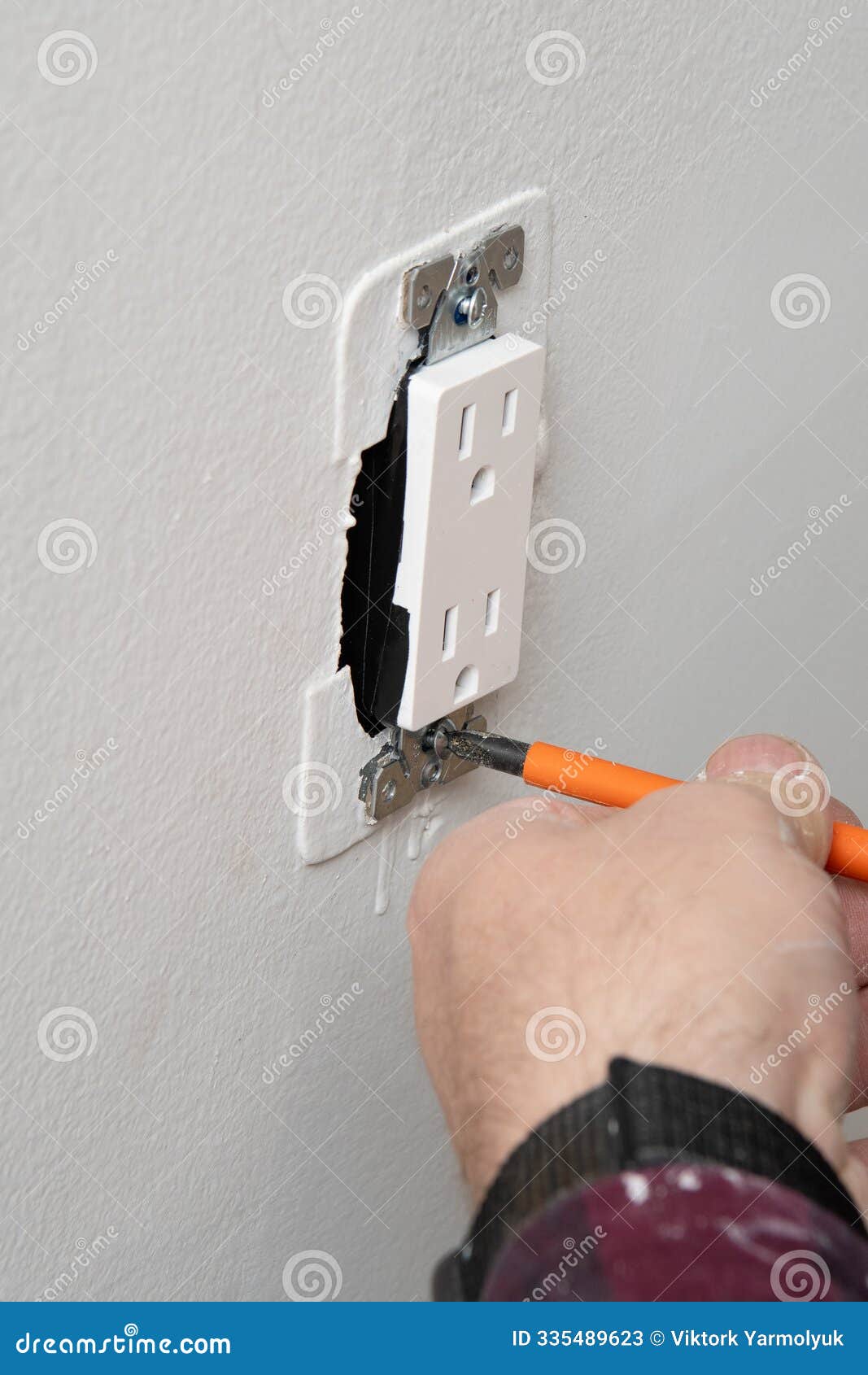 Installing an Electrical Outlet on the Wall Stock Image - Image of ...