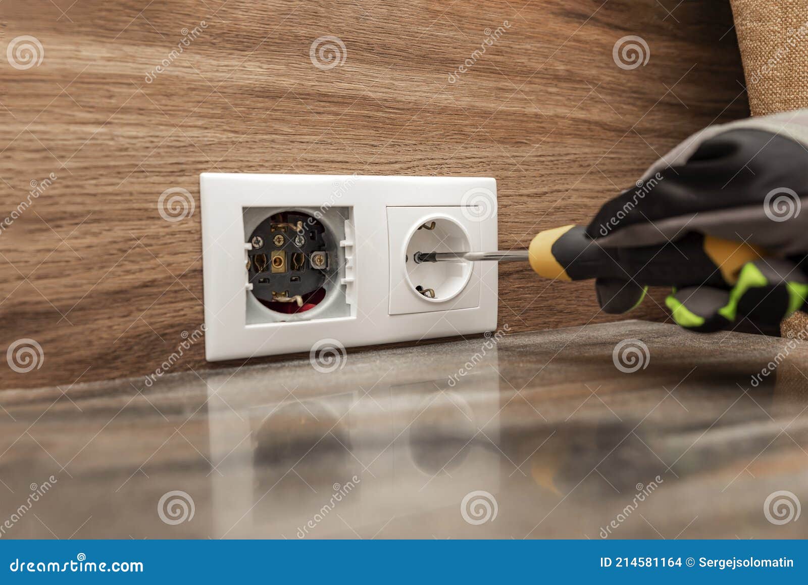 Installing Electrical Outlets. the Electrician Installs a Decorative ...