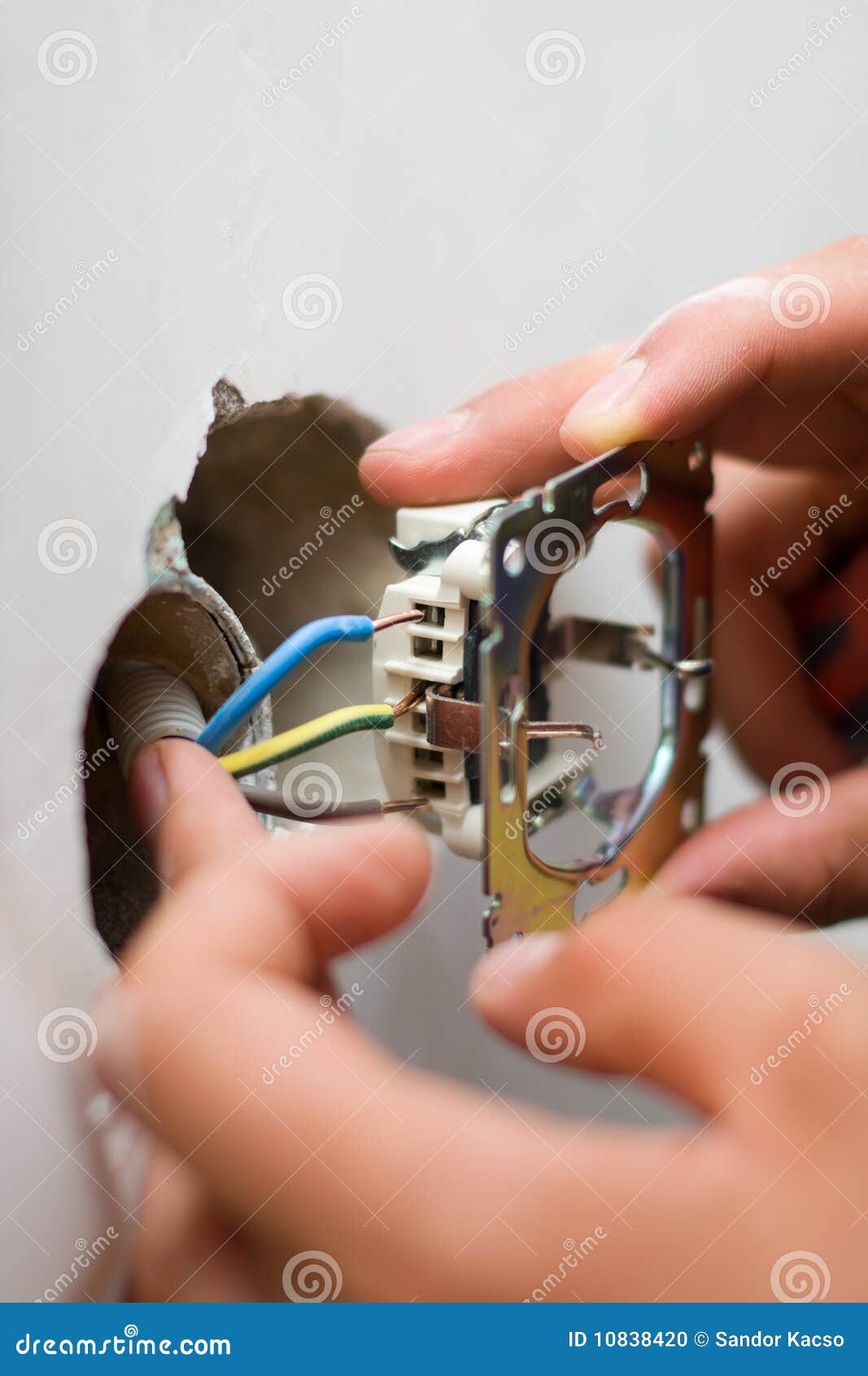 Installing an Electrical Plug / Contact Stock Photo - Image of ...