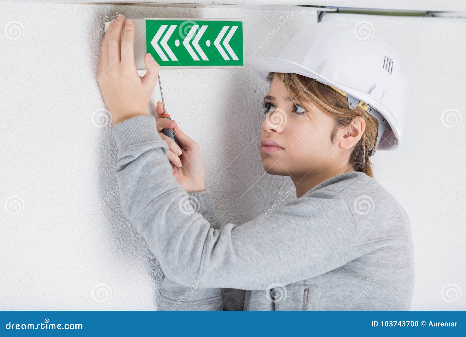 Installing Emergency Sign Arrow Stock Photo - Image of sign, contract ...