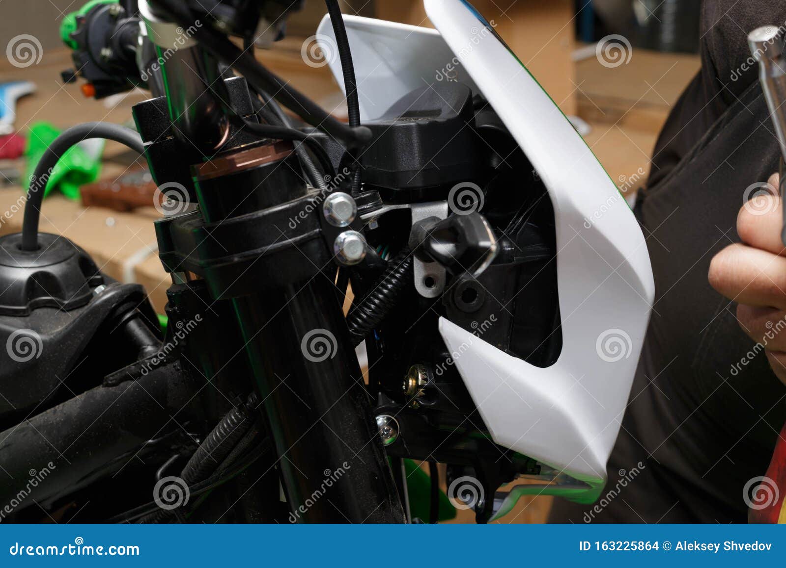 Installing the Front Lamp with a Plastic Lining on the Motorcycle Stock ...