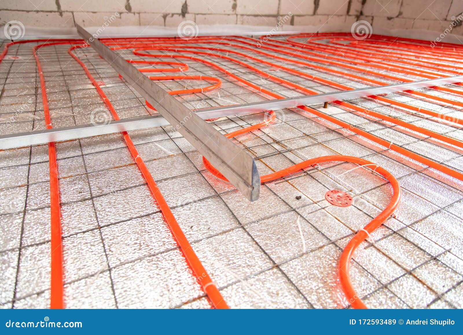 Installing a Hose for Underfloor Heating in the Room Stock Image ...