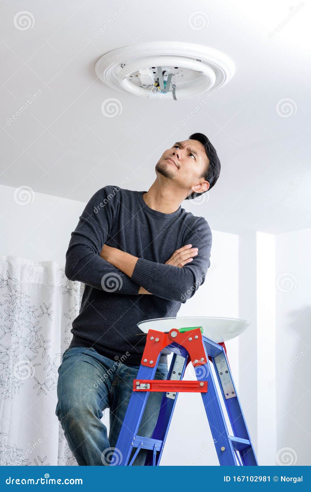 Installing light bulb stock image. Image of lightbulb - 167102981
