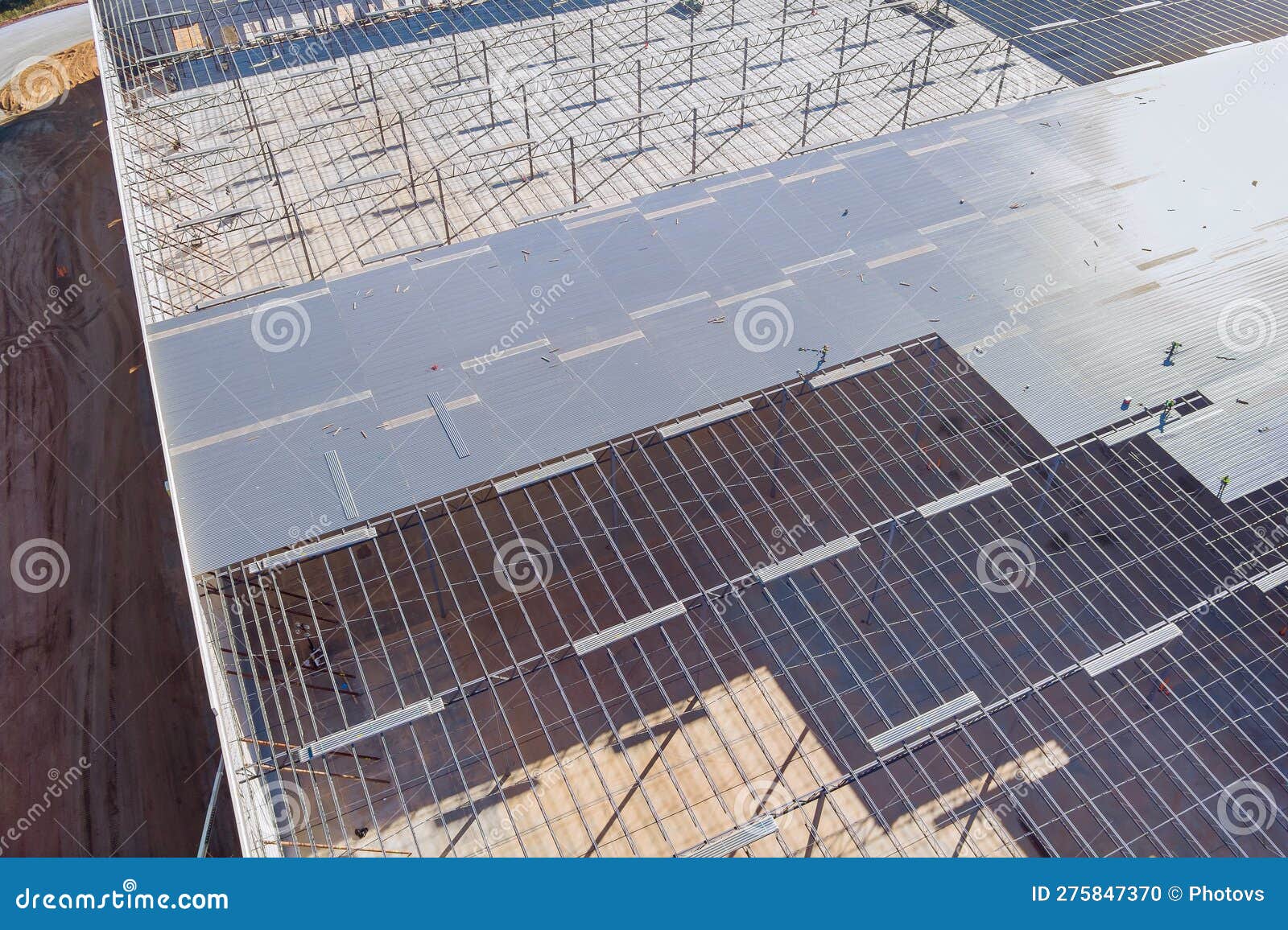 Installing a Metal Construction Frame for Steel Warehouse Work on a ...